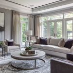How Grey Hues and Luxe Finishes Create a Classy Living Room